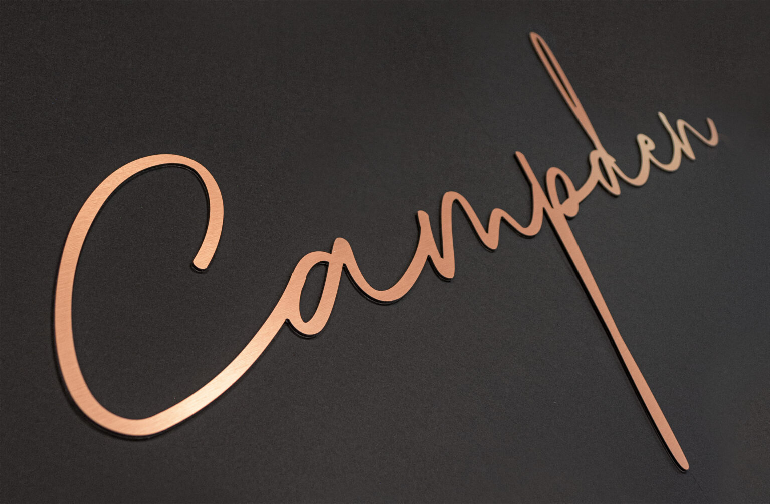 Creating impact with copper dibond signage and copper vinyl window ...